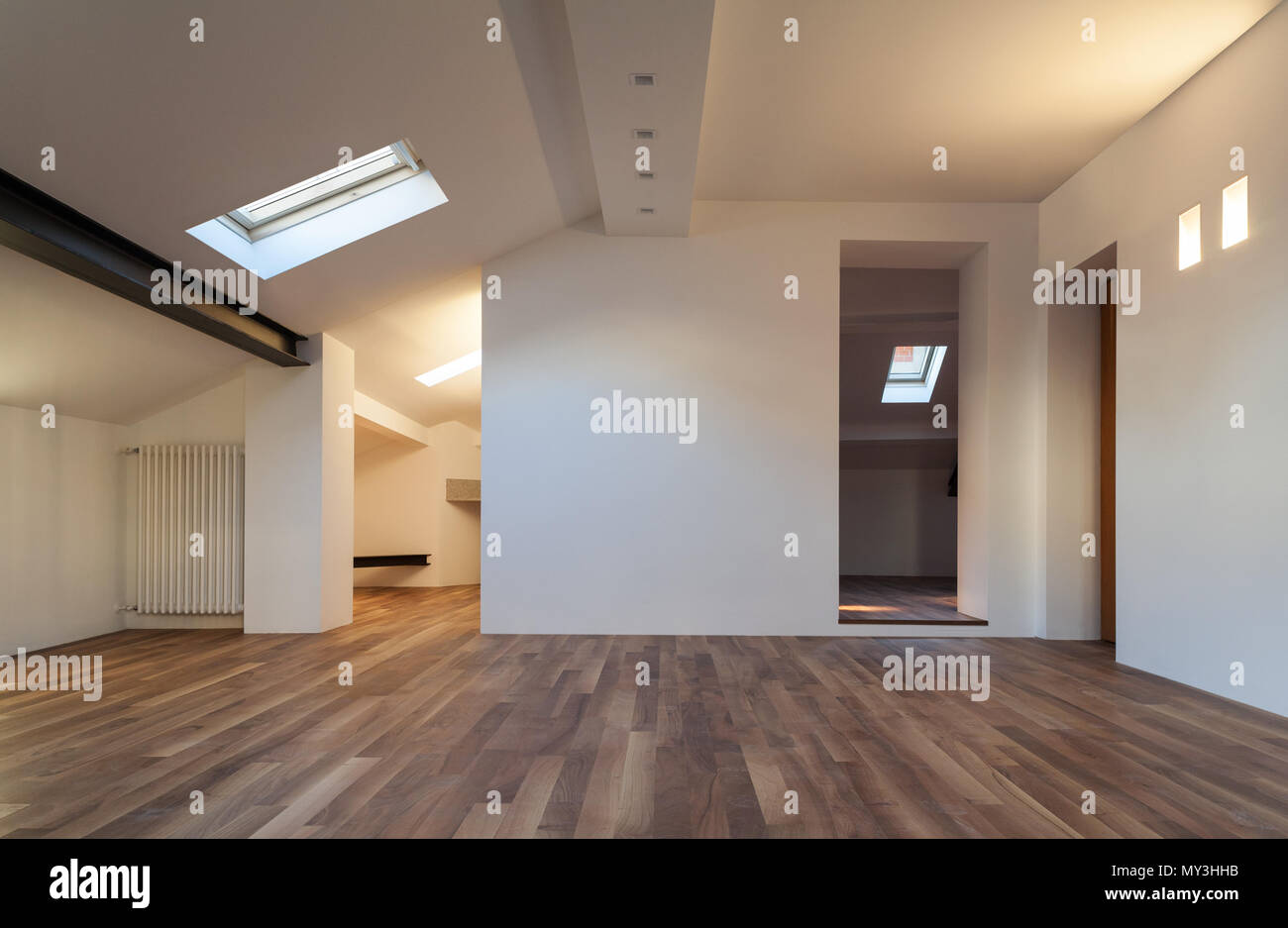 Interior nice loft, wall white, parquet floor Stock Photo - Alamy
