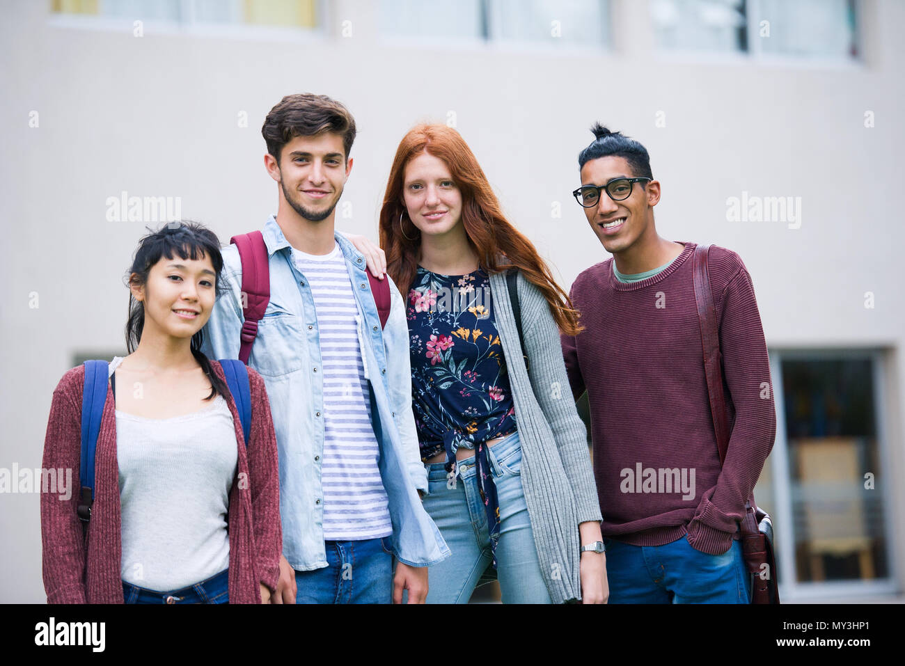 College students standing together outdoors, portrait Stock Photo - Alamy