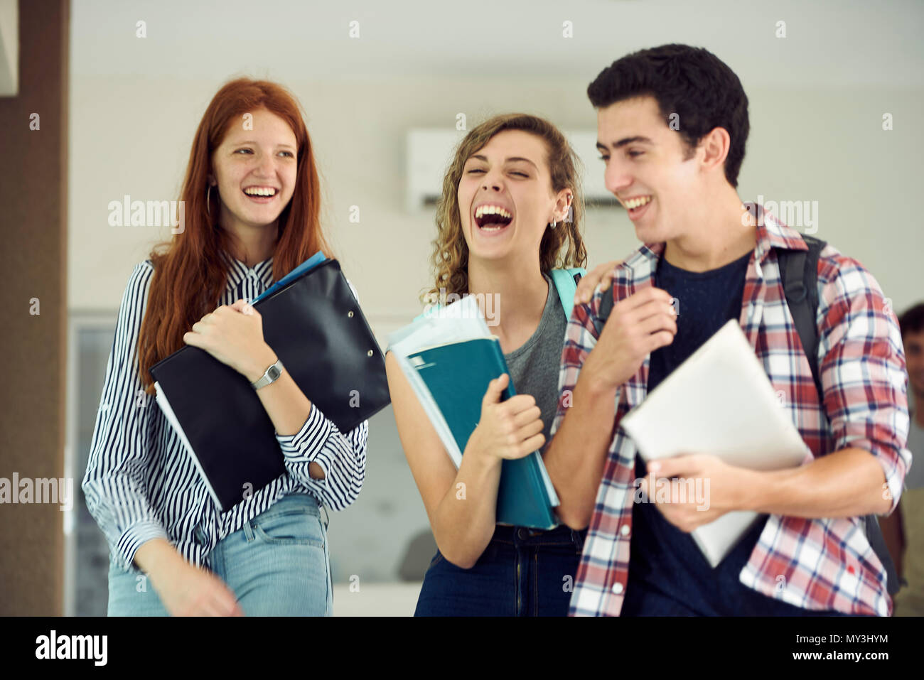 Friends Laughing Together At School