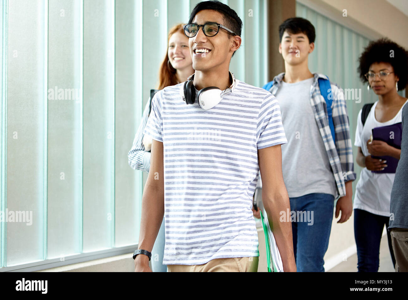 Male high school student walking hi-res stock photography and images ...