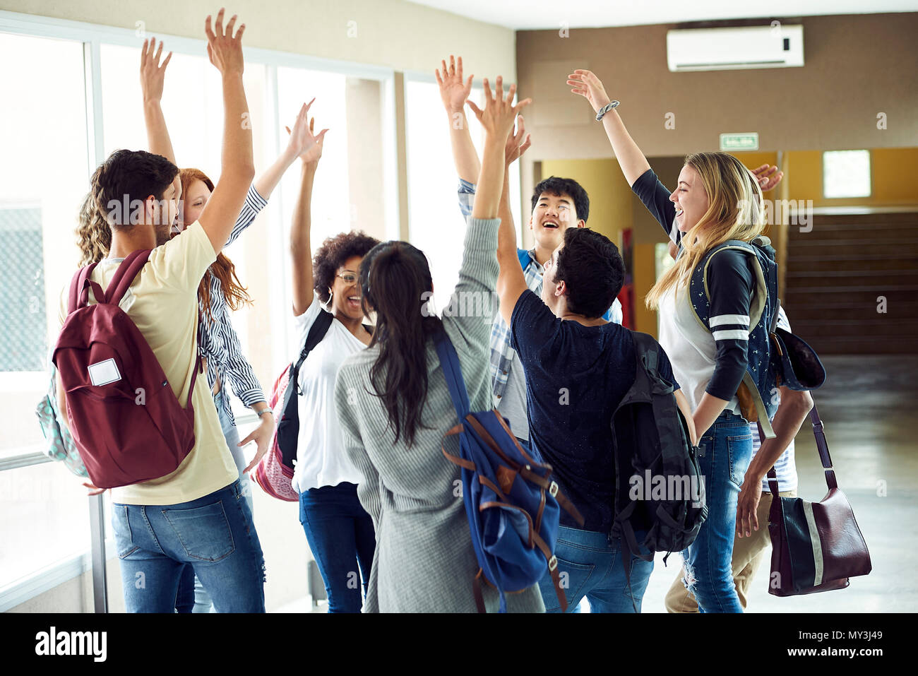 Adult student raised hand hi-res stock photography and images - Alamy