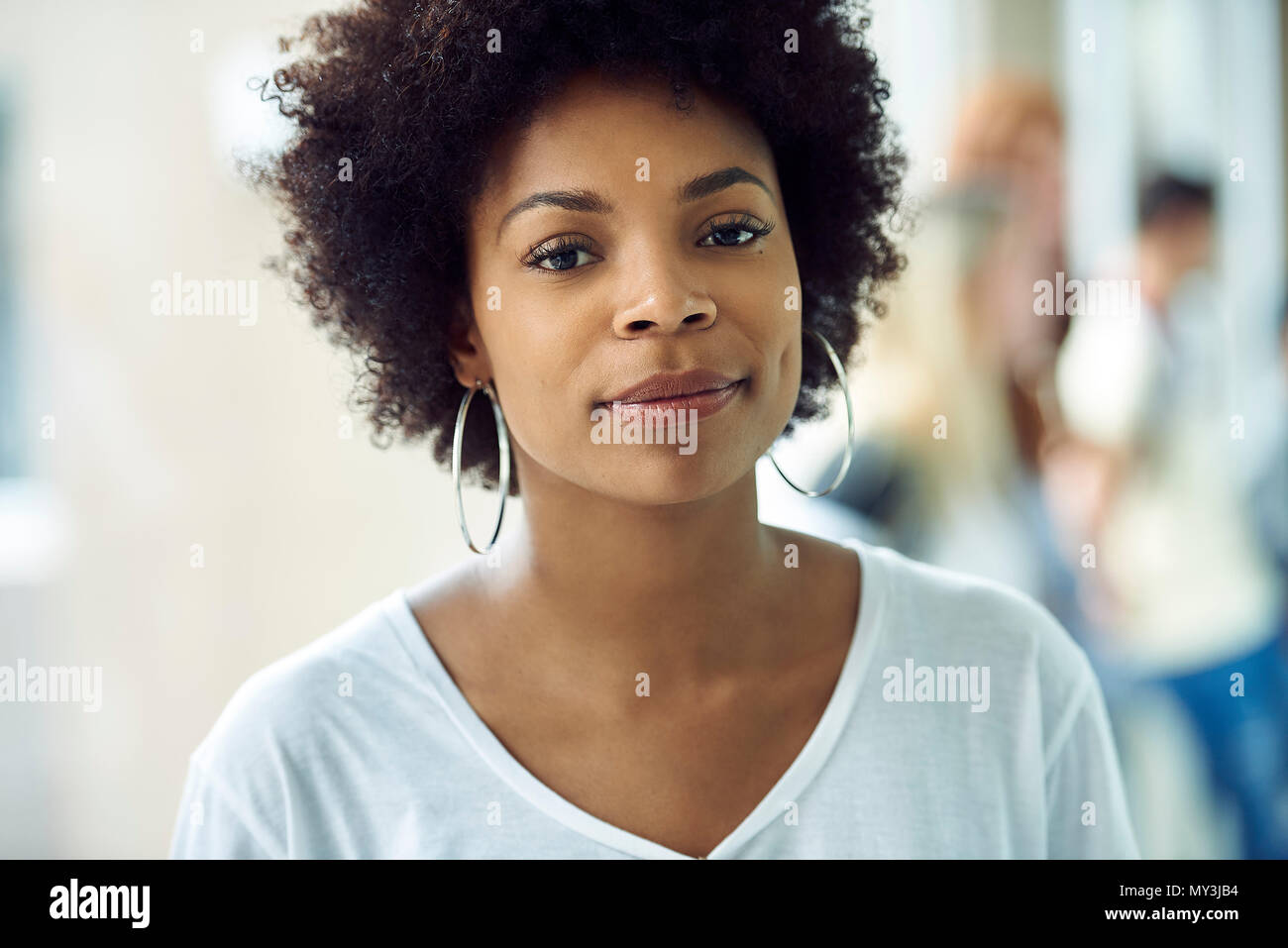 Female college student smiling cheerfully, portrait Stock Photo - Alamy