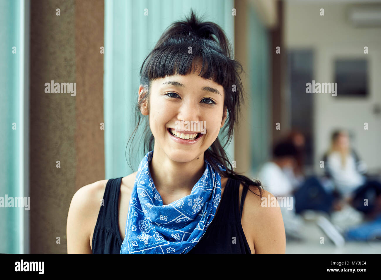 Female college student smiling cheerfully, portrait Stock Photo - Alamy