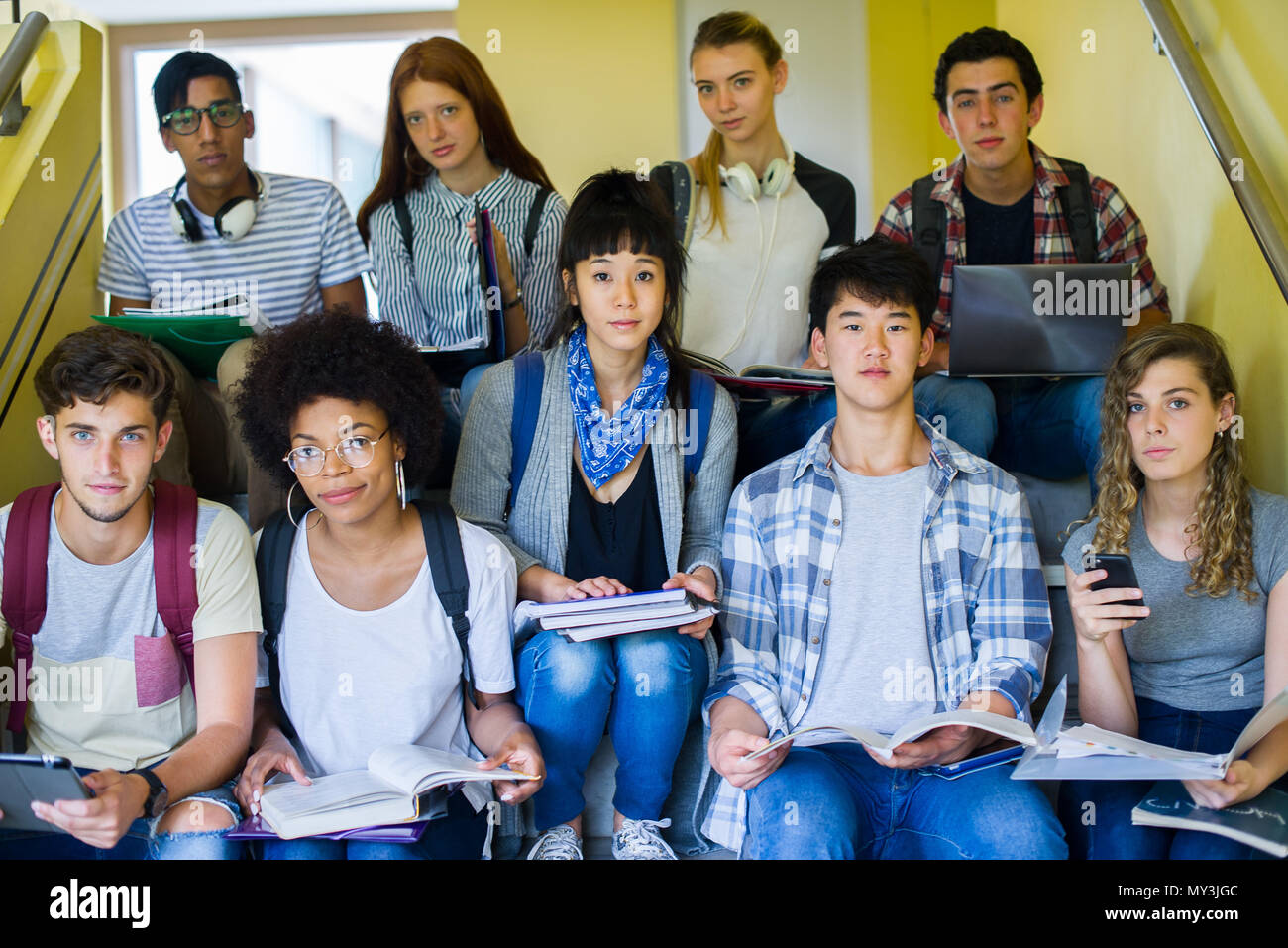 College students studying on stairs, portrait Stock Photo - Alamy
