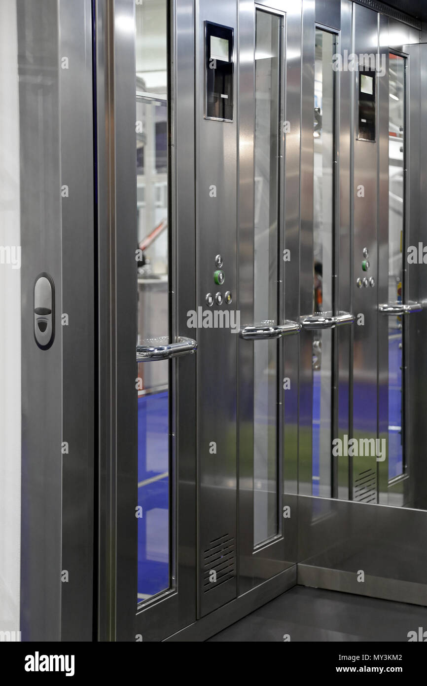 Stainless Steel Modern Elevator Lift Cabin With Window Stock Photo - Alamy