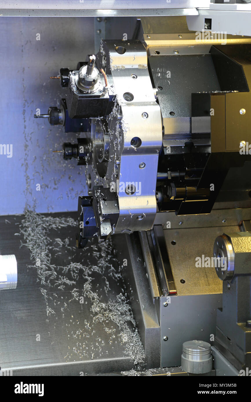 Automated Cnc Metal Lathe Head Machine Tool Stock Photo - Alamy