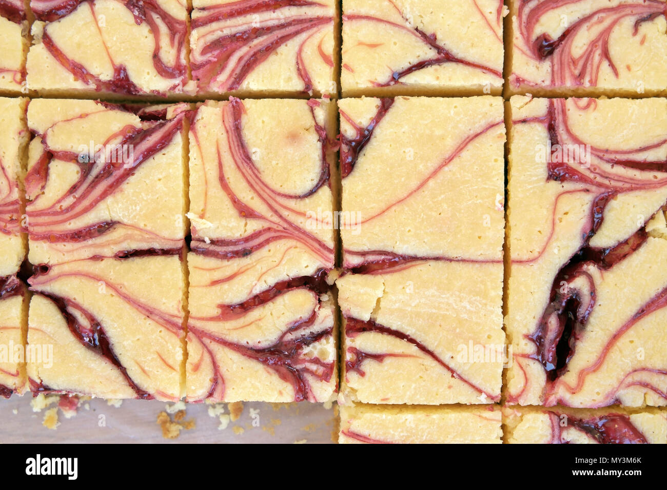 Background texture of vanilla cake topped with strawberries. Top view ...