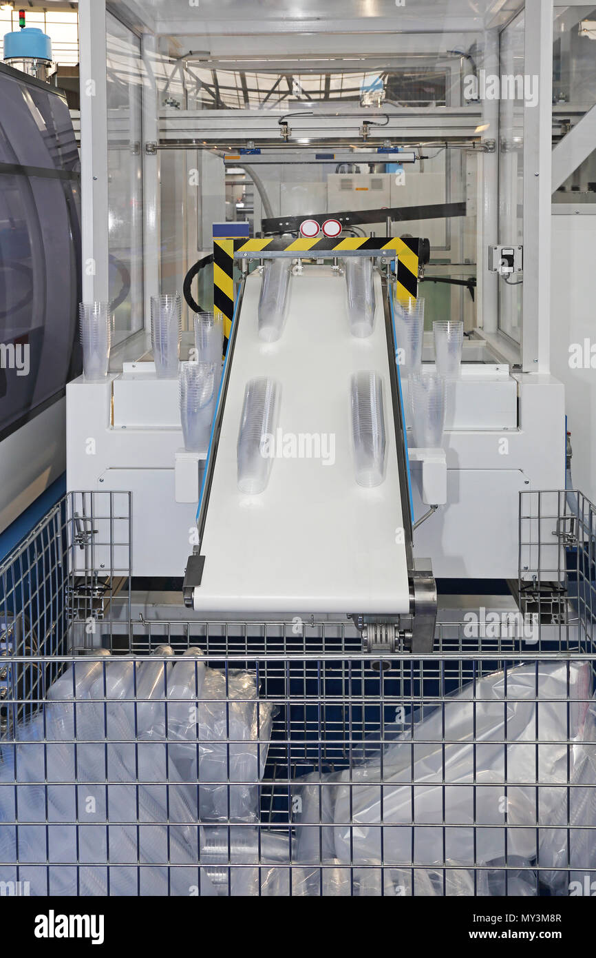 Plastic Cups Manufacture Production in Factory Stock Photo - Alamy