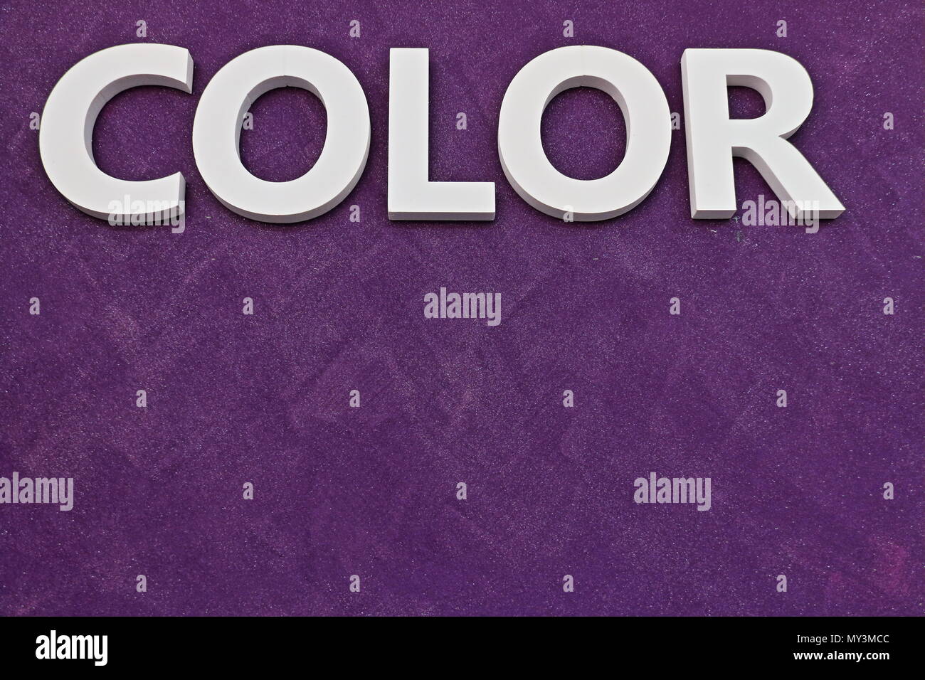 Purple background with the word color Stock Photo - Alamy