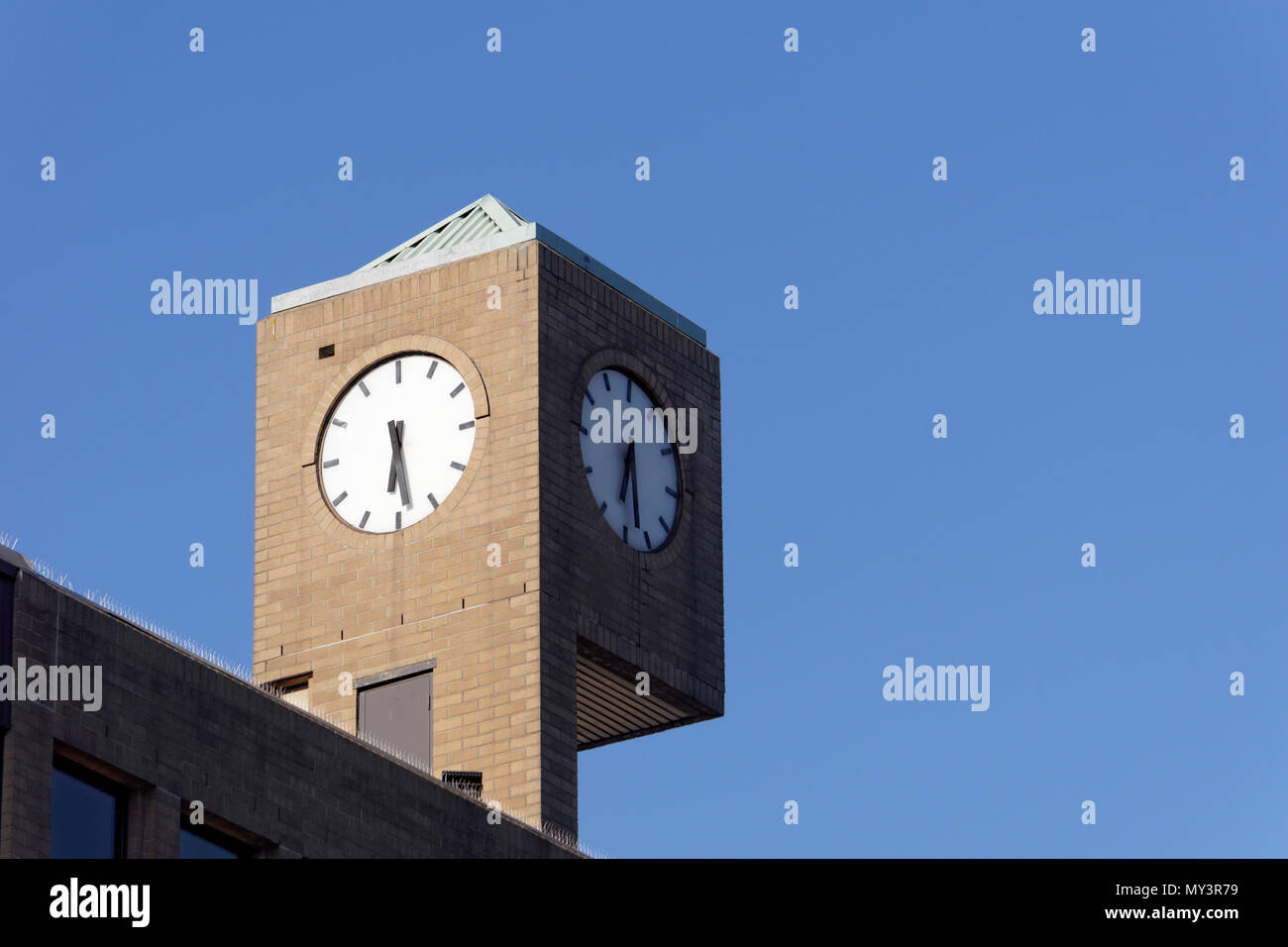 Outdoor clock on the The Clock Tower building at the corner of West ...