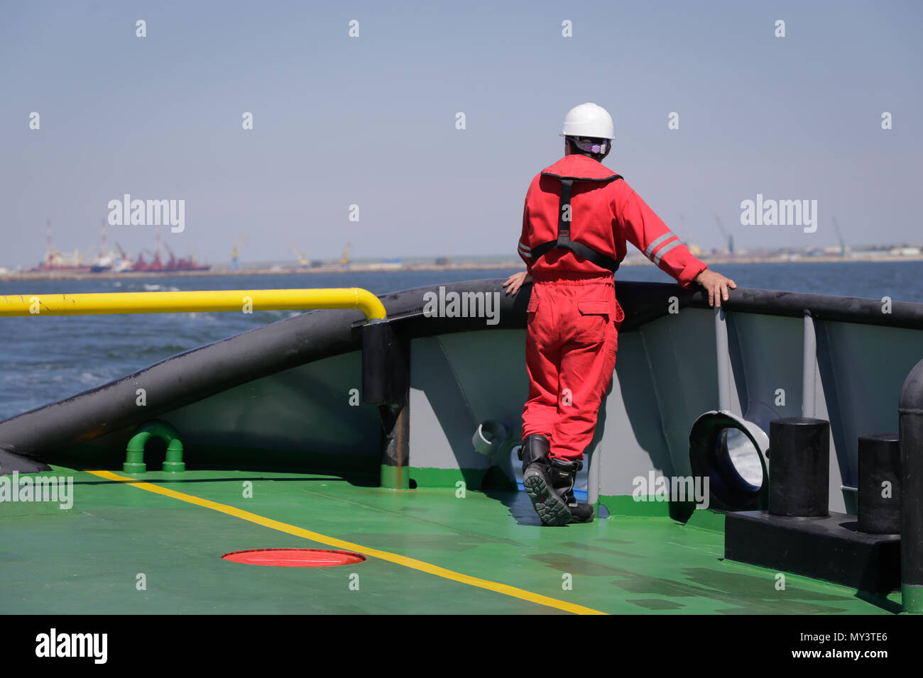 CONSTANTA, ROMANIA - MAY 19, 2018: Sailor aboard a tug boat at sea ...