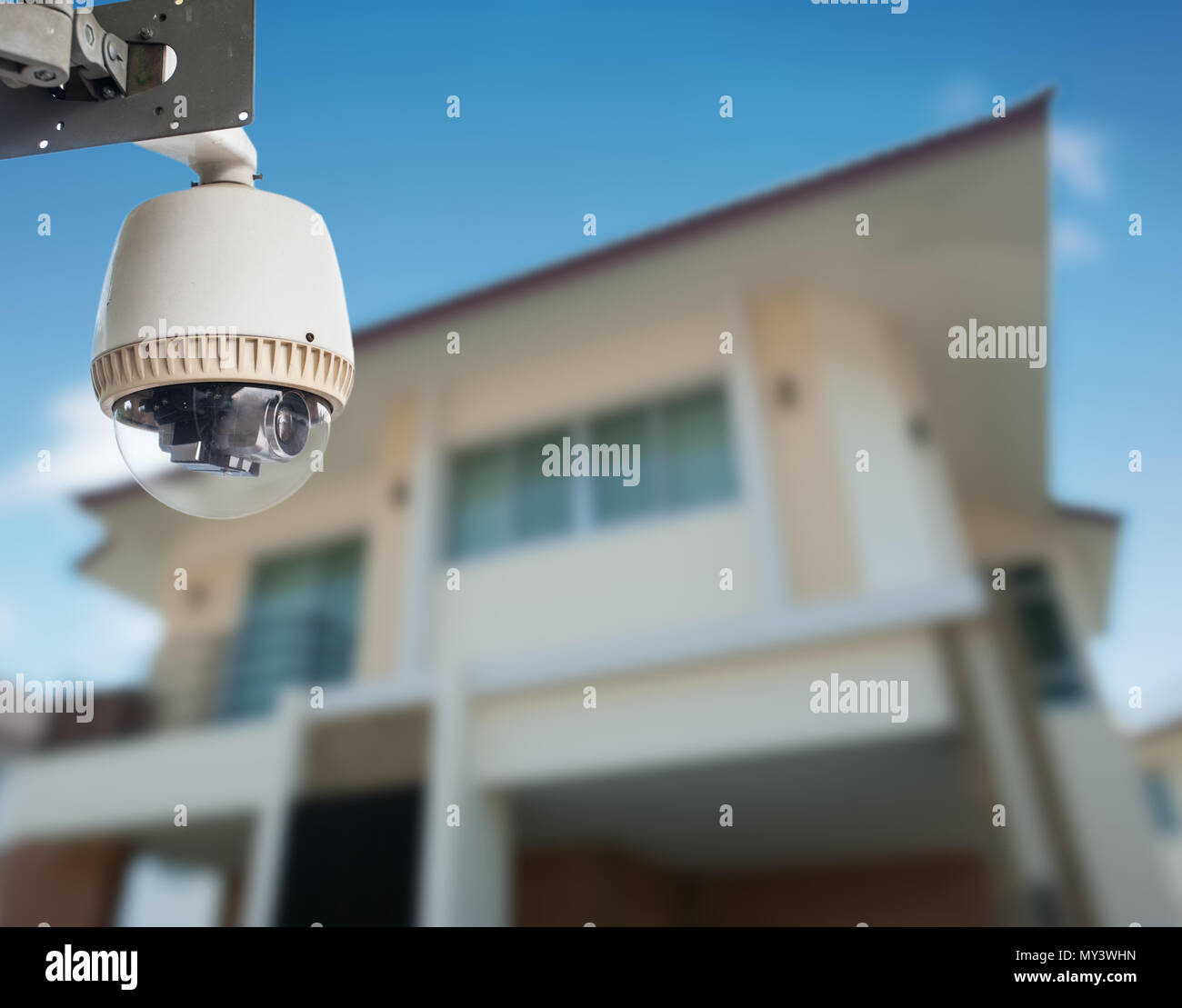CCTV Camera with house in background Stock Photo - Alamy