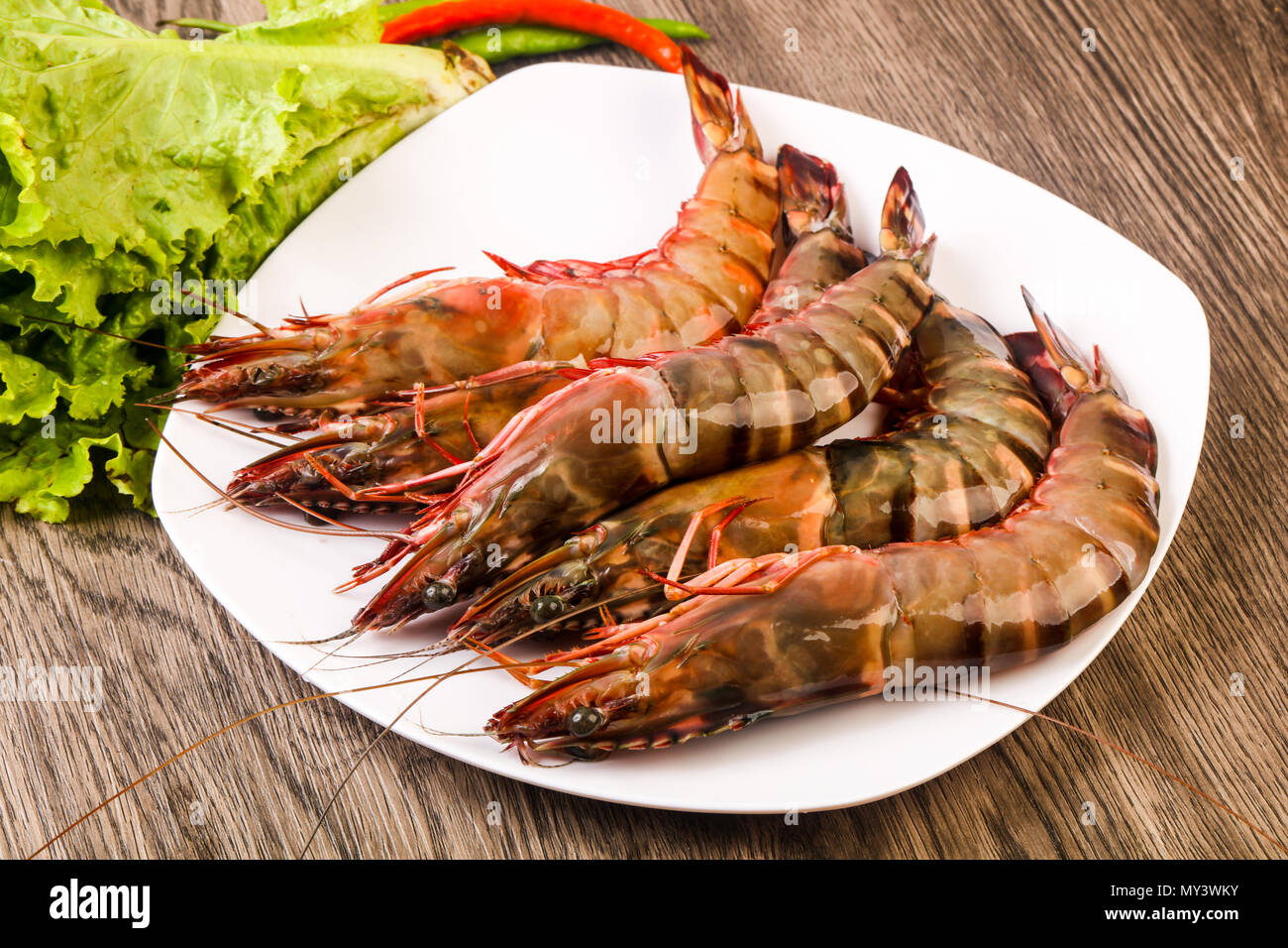 Raw big tiger prawn - ready for cooking Stock Photo - Alamy