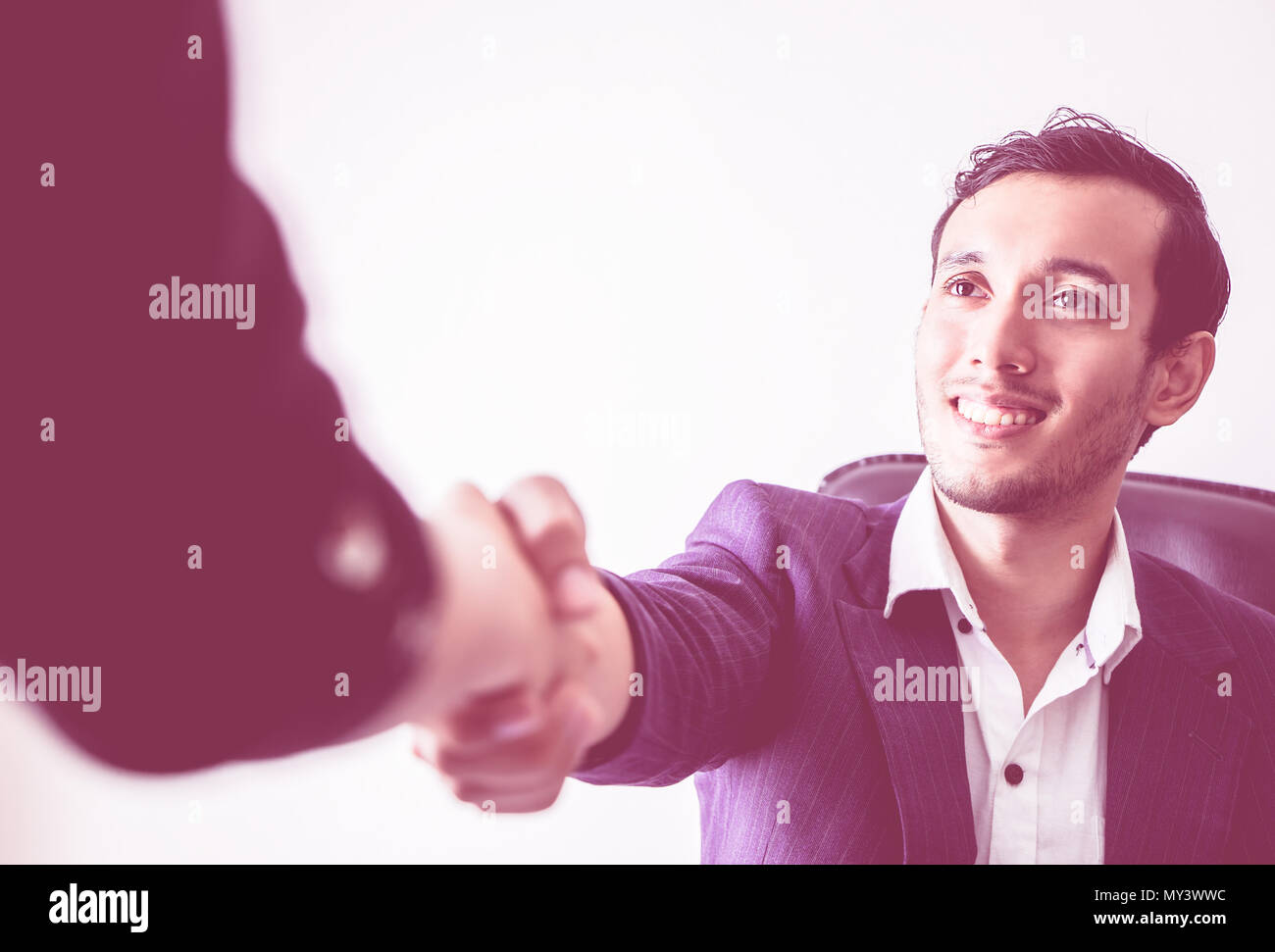 Happy business man is shaking hand closing the deal with smile Stock ...