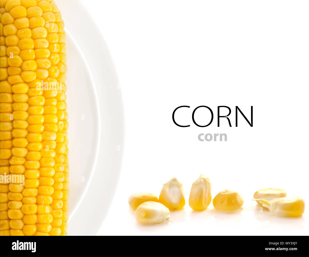Corn on the plate on a white background Stock Photo - Alamy