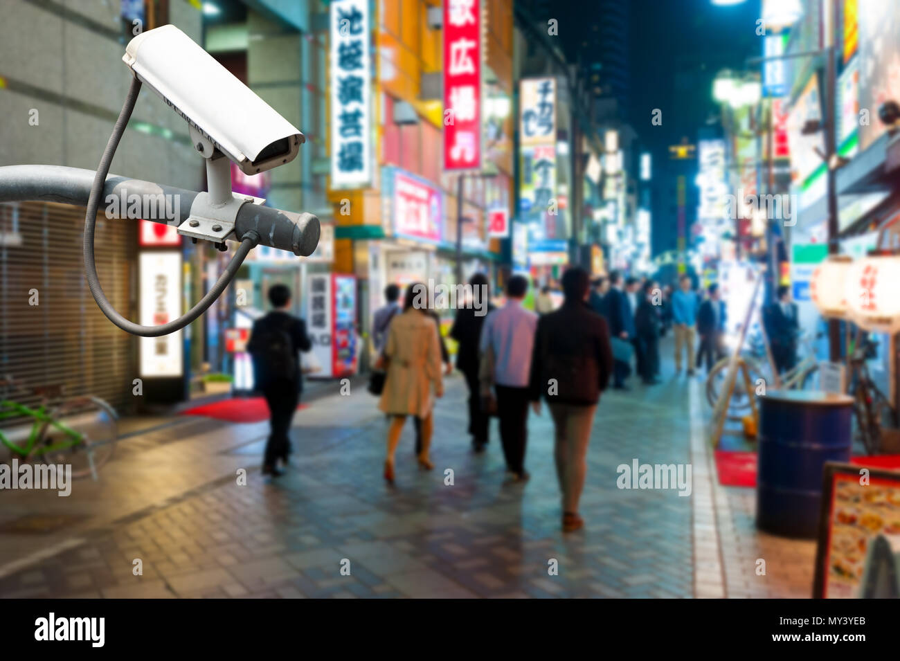 CCTV Camera or surveillance oeprating on street at night Stock Photo ...