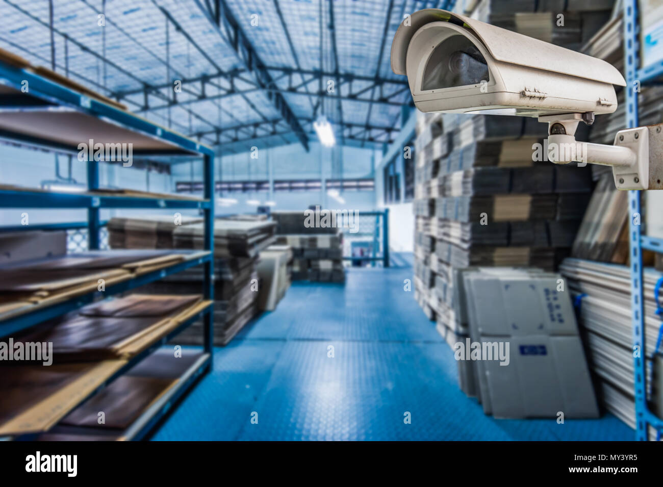 CCTV Camera Operating inside warehouse or factory Stock Photo - Alamy