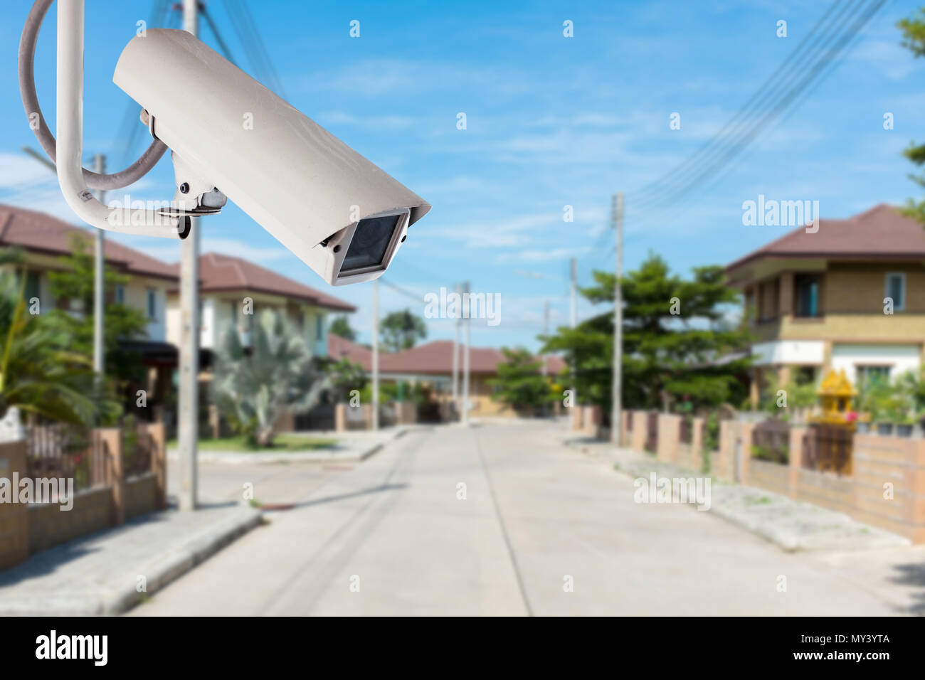 CCTV Camera with house in background Stock Photo - Alamy