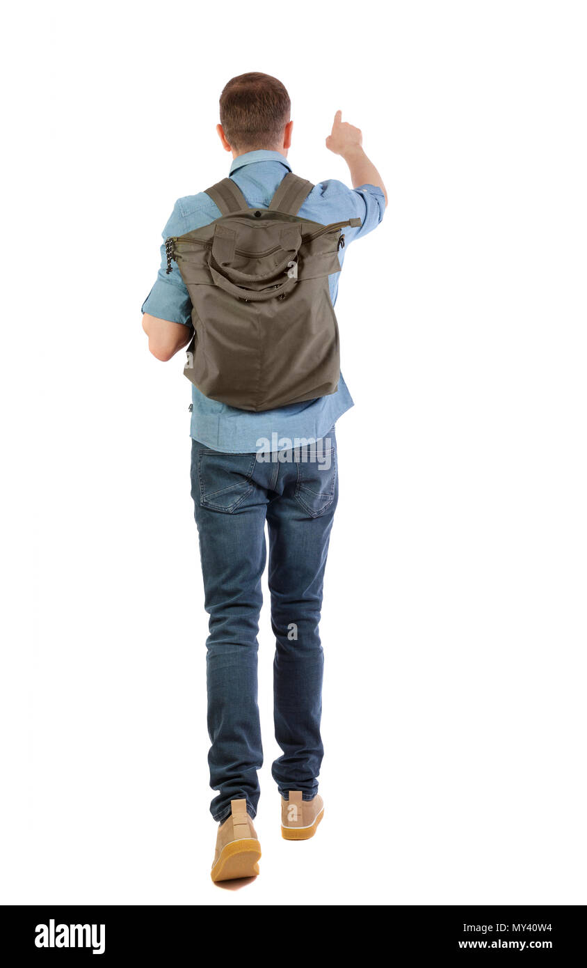 Back view of a walking man with a bag pointing his hand up. backside ...