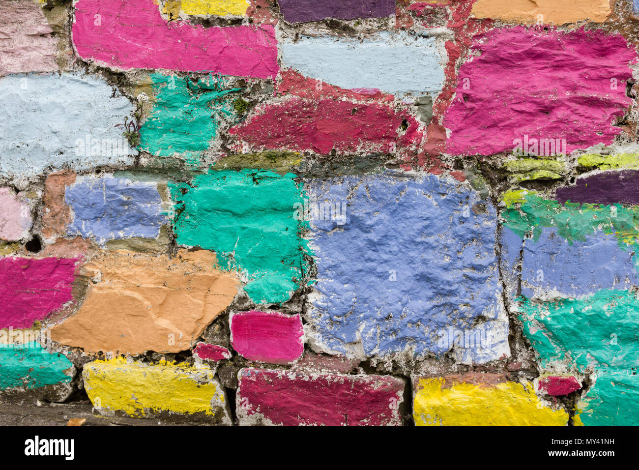 Colorful brick wall graffiti hi-res stock photography and images - Alamy