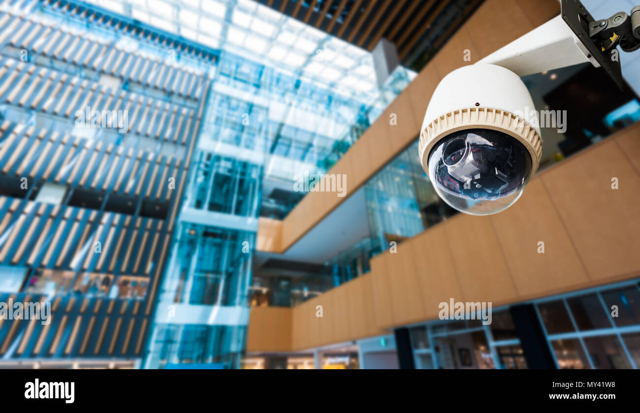 CCTV Camera or surveillance operating on window building Stock Photo ...