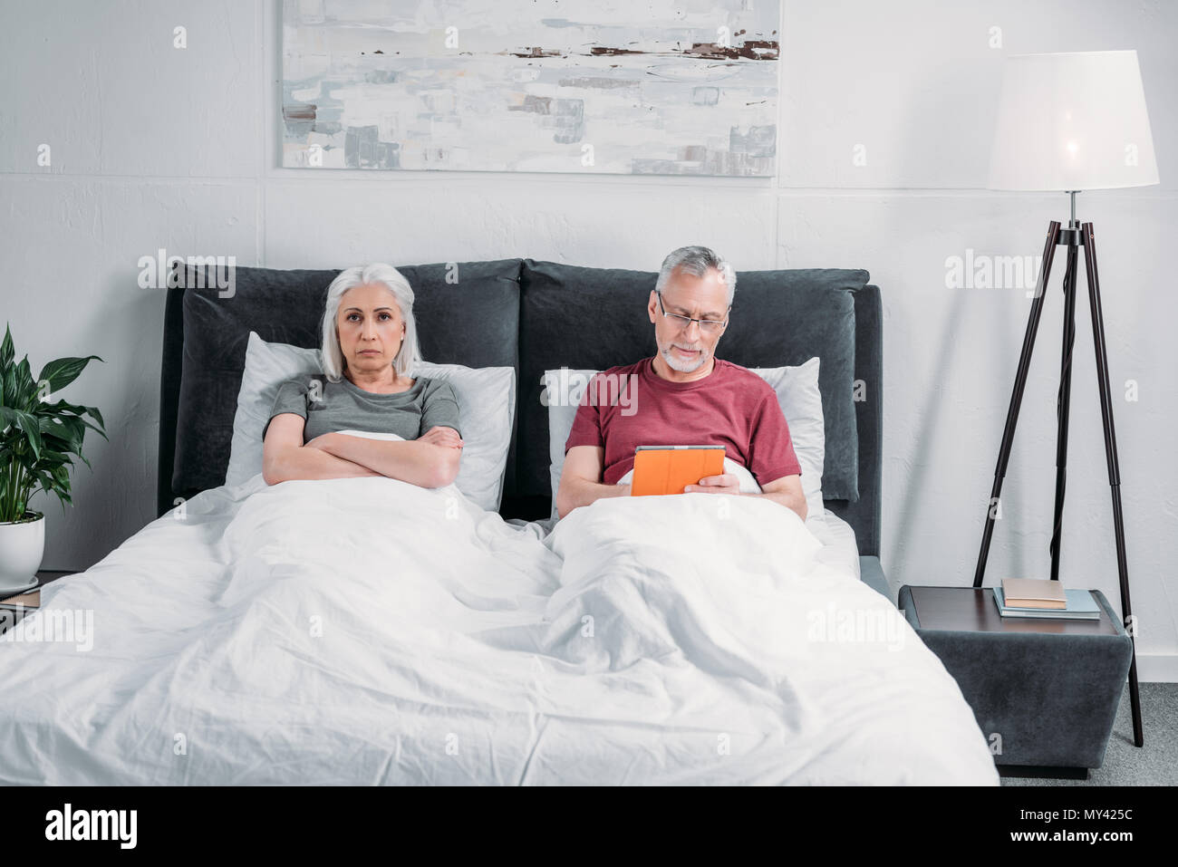Grumpy man in bed hi-res stock photography and images - Alamy