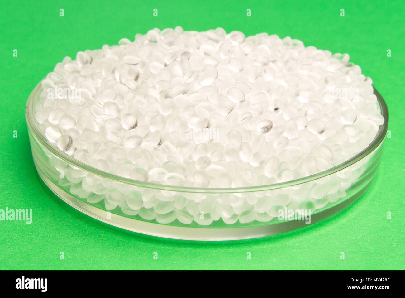 Plastic pellets. Transparent Polyethylene granules. Plastic Raw ...