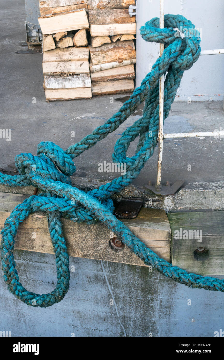 Old rope background. Big sea rope, rusty metal and firewood Stock Photo ...