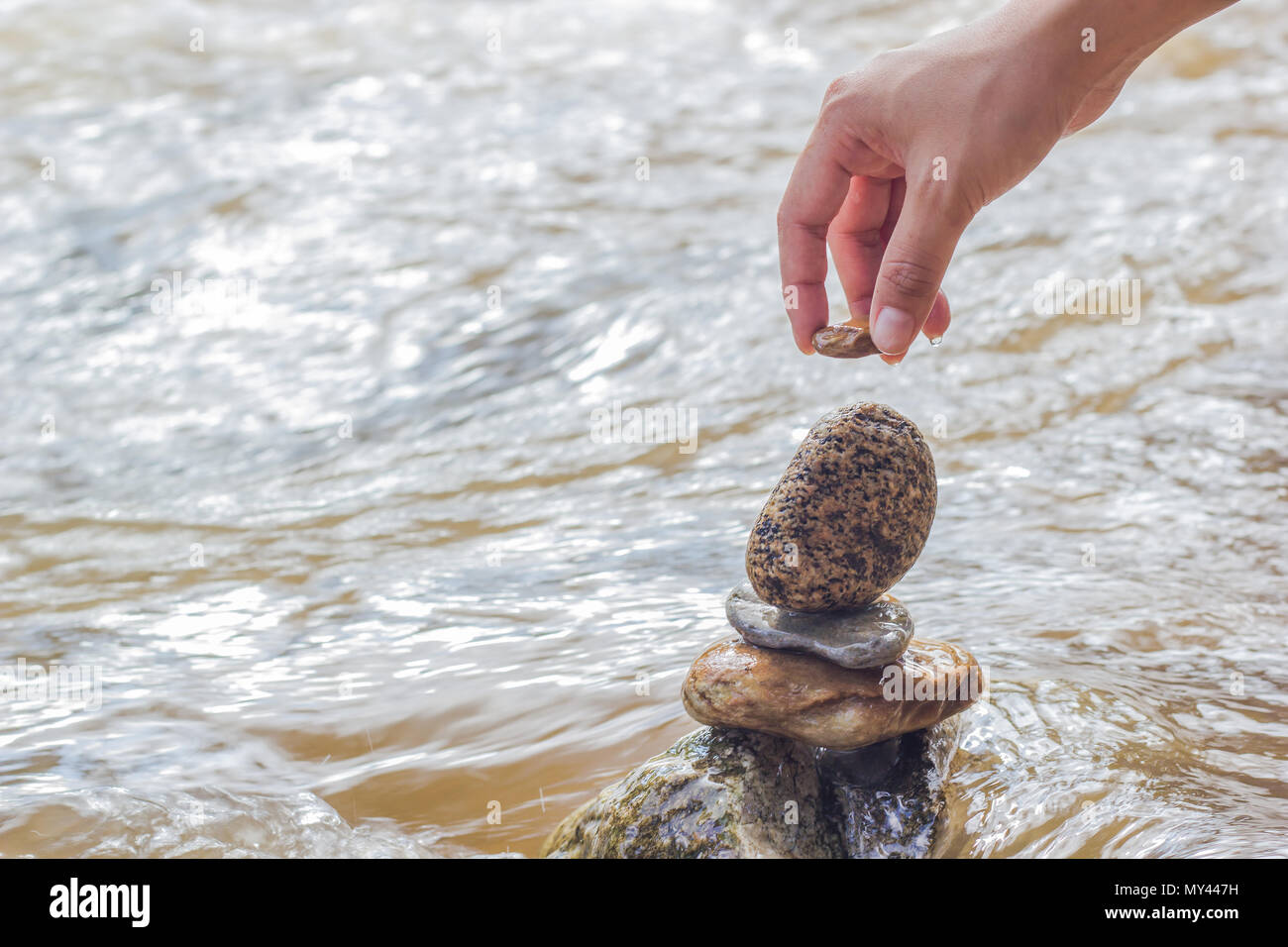 Stacking stones hi-res stock photography and images - Alamy