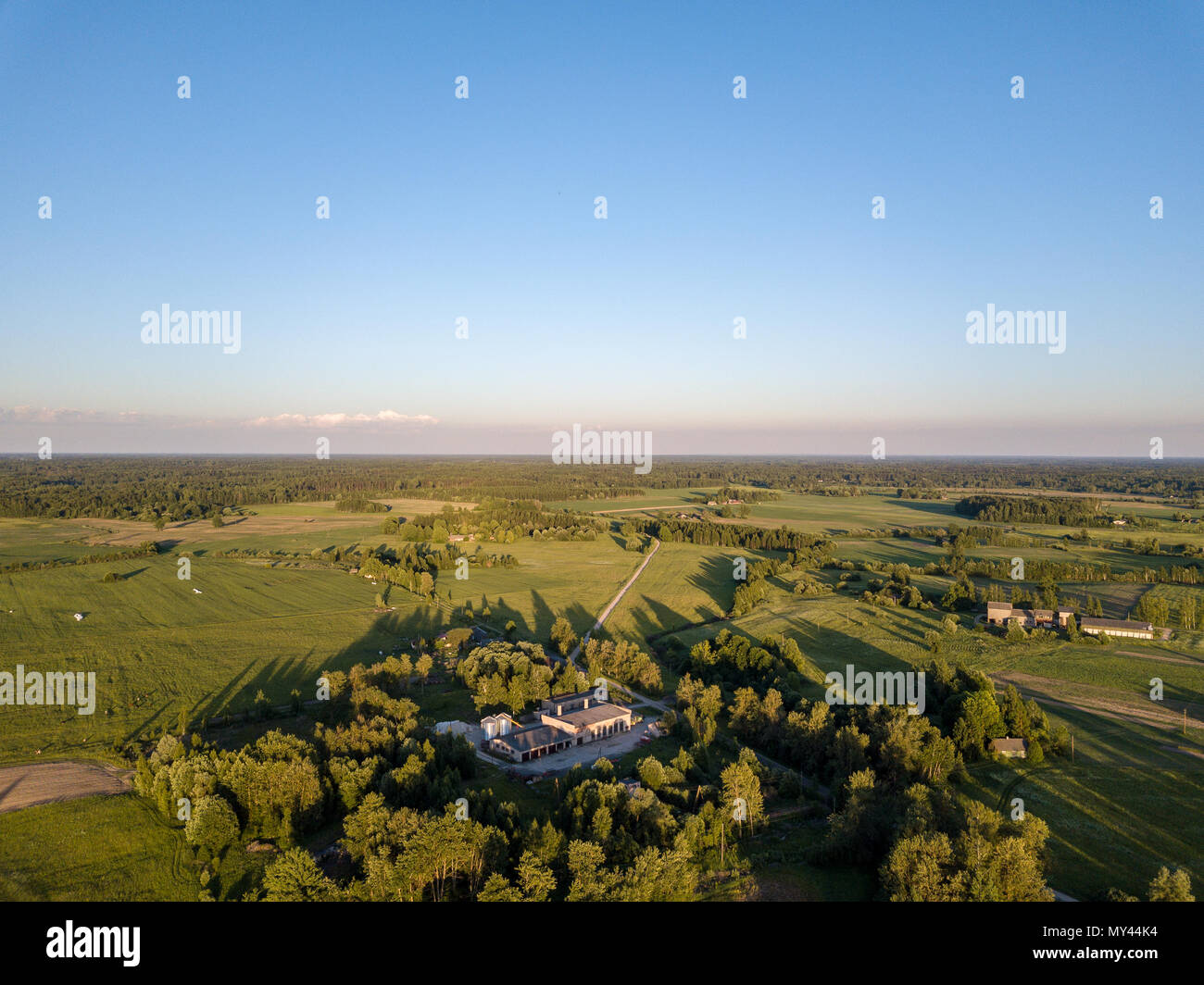 drone image. aerial view of rural area with fields and forests in ...