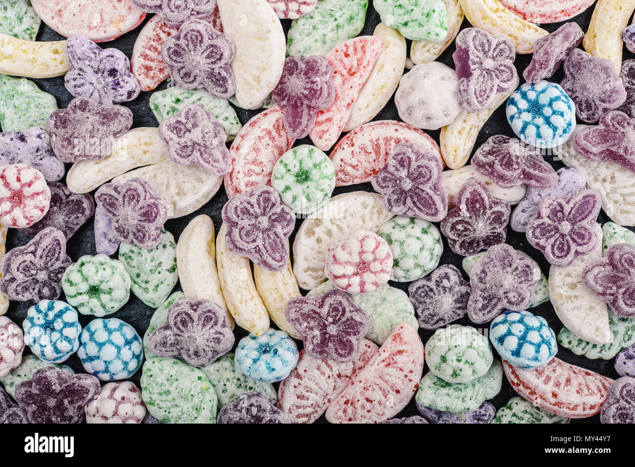 Mixed colorful fruit bonbon close up, may use as background Stock Photo ...