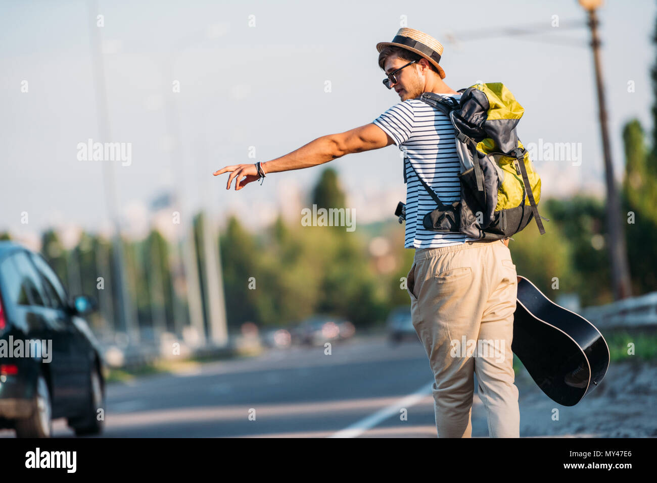 Rear view young man guitar hi-res stock photography and images - Alamy
