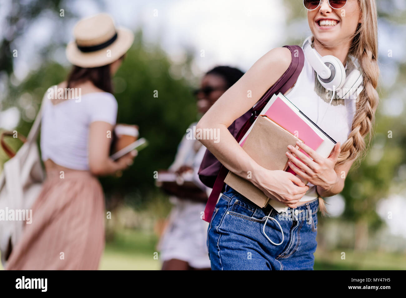 Students talking behind student hi-res stock photography and images - Alamy
