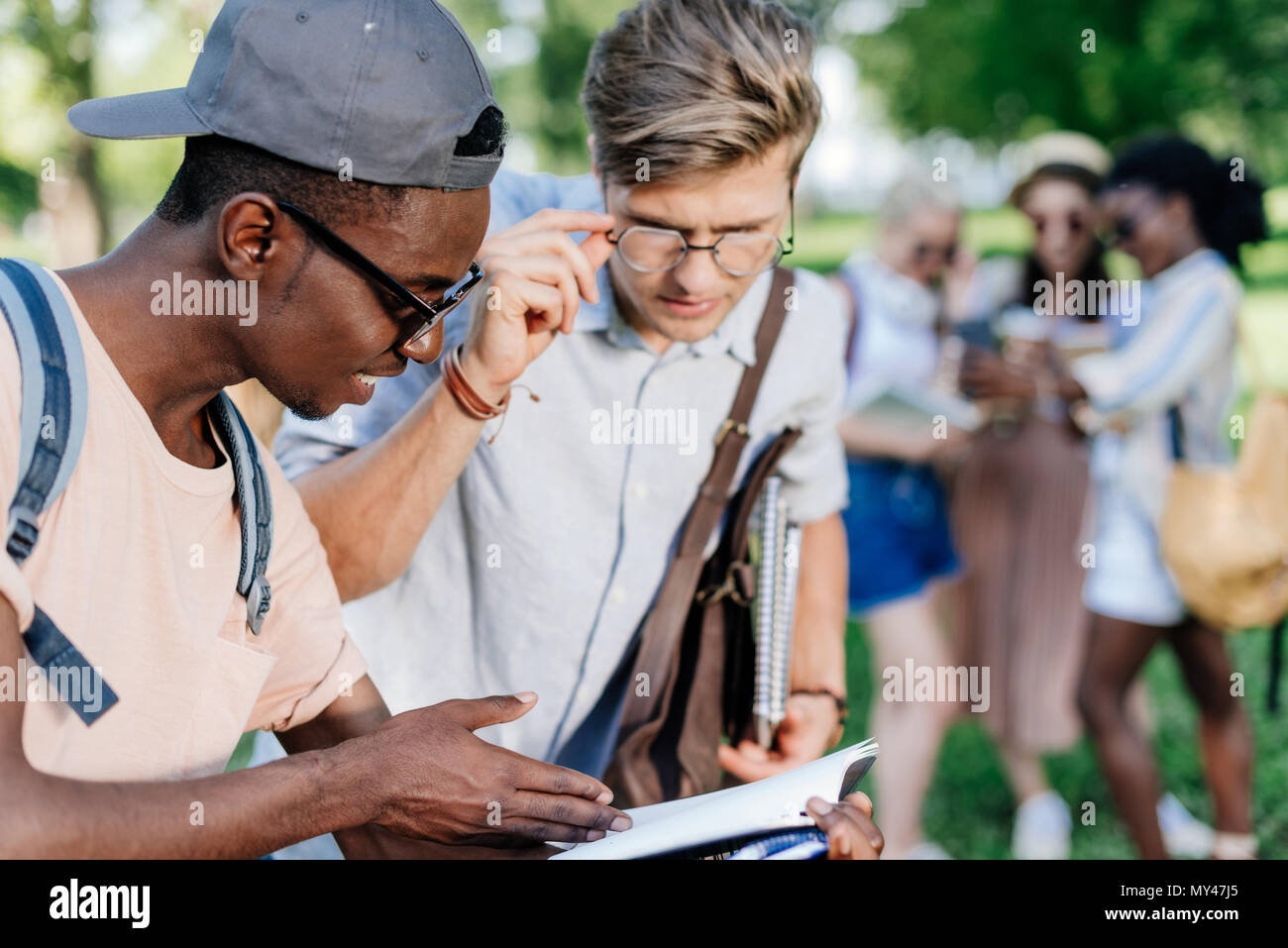Boys reading book hi-res stock photography and images - Alamy