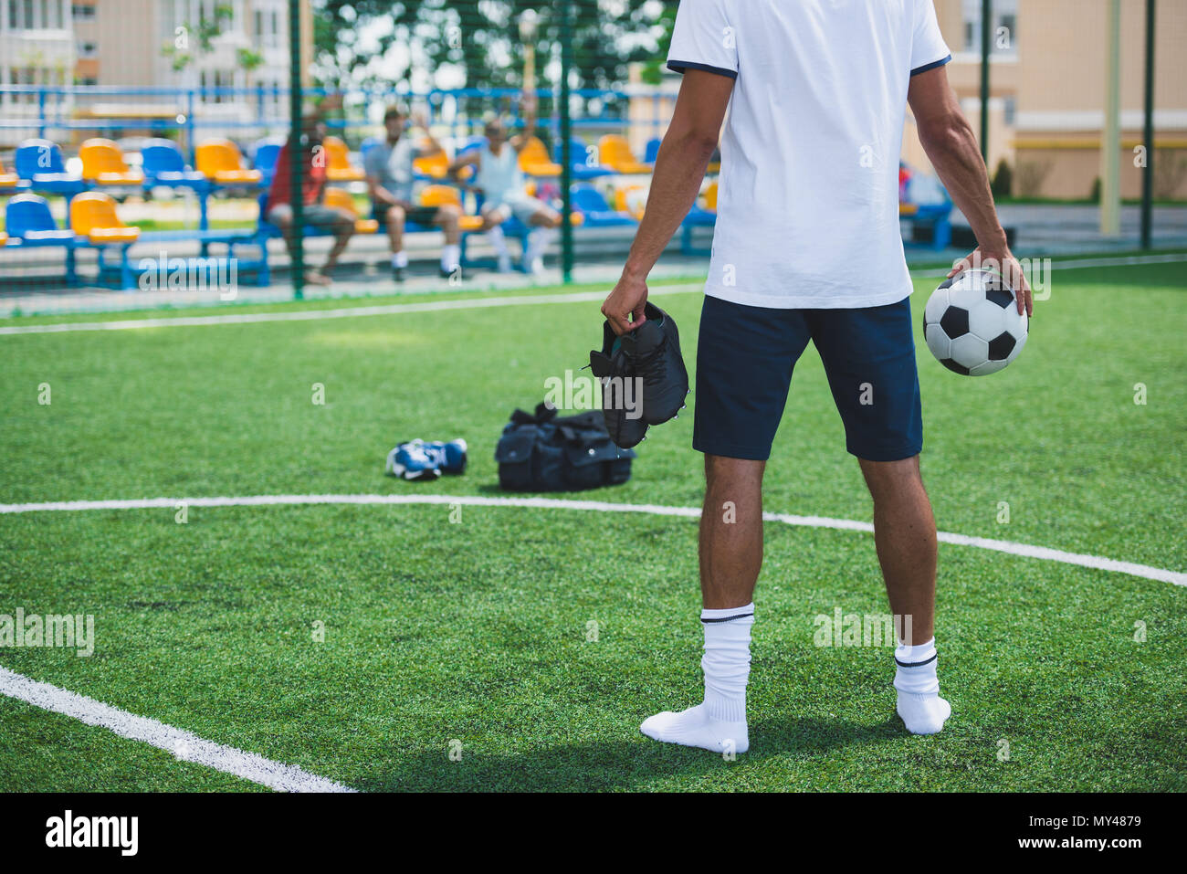 Football boots on pitch hi-res stock photography and images - Alamy
