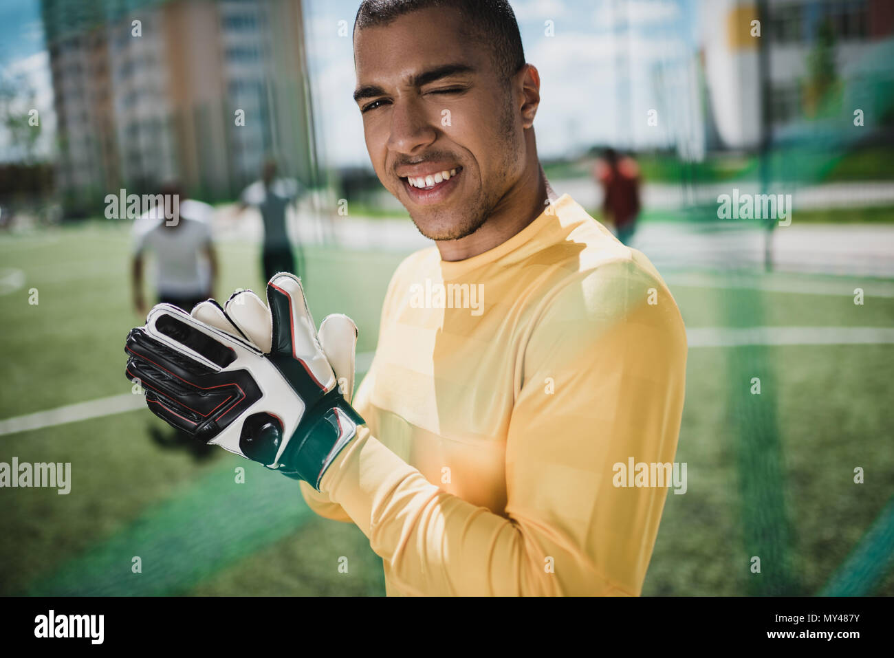 Smiling goalkeeper hi-res stock photography and images - Alamy