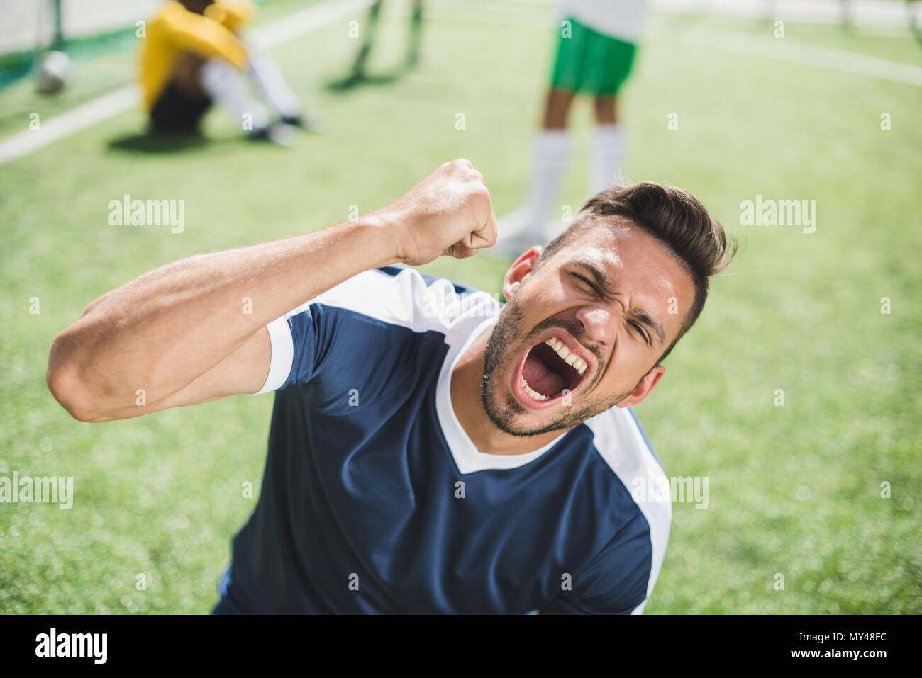 Soccer player celebrating hi-res stock photography and images - Alamy