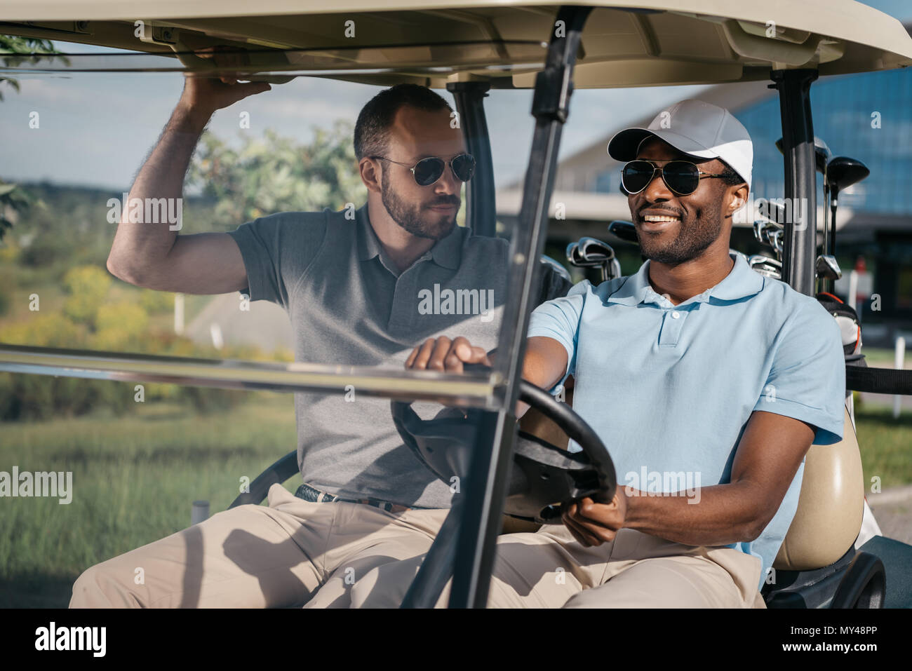 Man golf cart ride hi-res stock photography and images - Alamy
