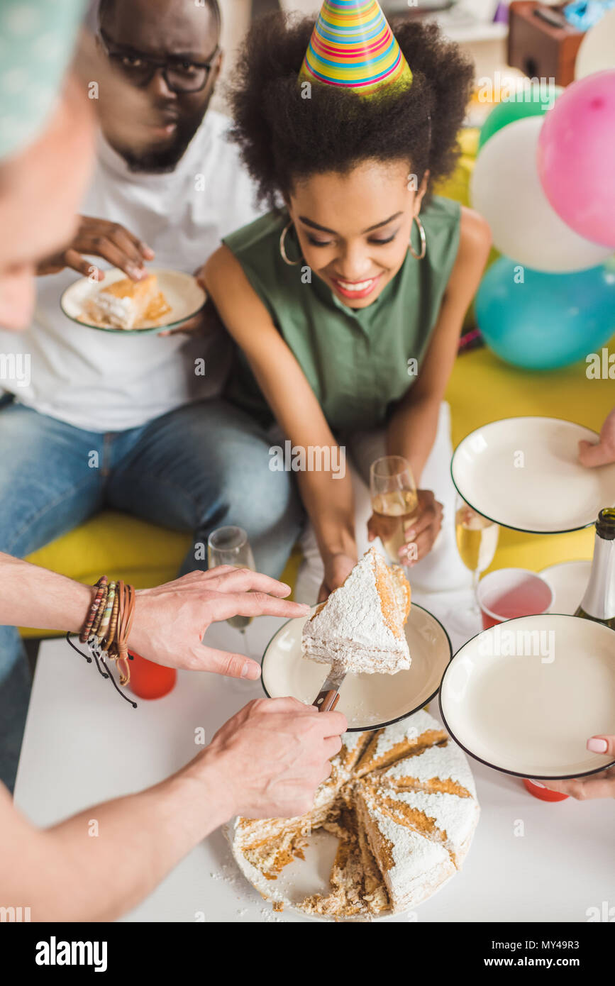 Cutting birthday cake hi-res stock photography and images - Alamy
