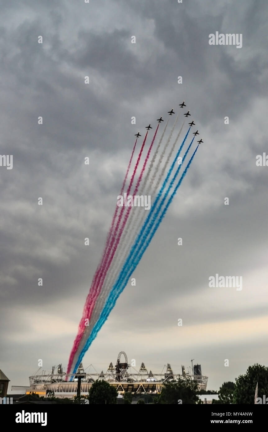 Royal Air Force Red Arrows display team jet planes fly over to open ...