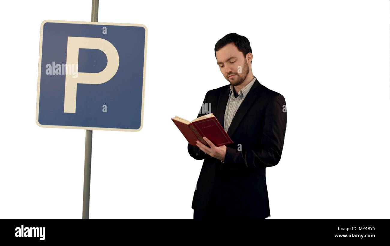 Man reading a book with parking sign on white background isolated Stock ...