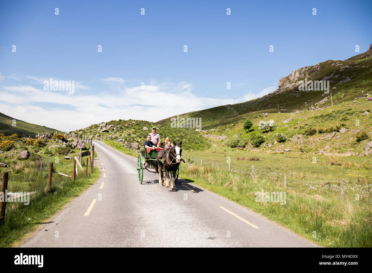 June 4th, 2018, Gap of Dunloe, Ireland - people enjoying a horse ...