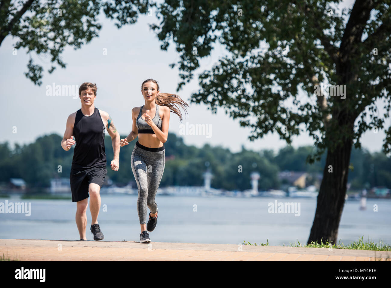 Couple jogging together hi-res stock photography and images - Alamy