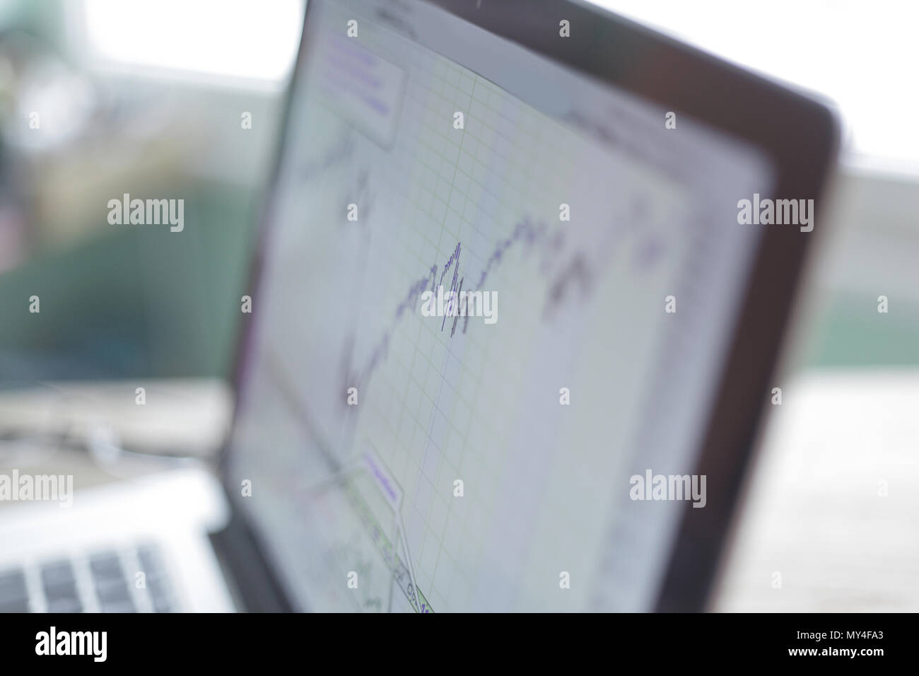 laptop with financial chart on the screen.close up Stock Photo - Alamy