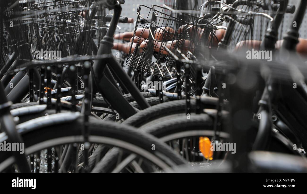 Row parked different bicycles hi-res stock photography and images - Alamy