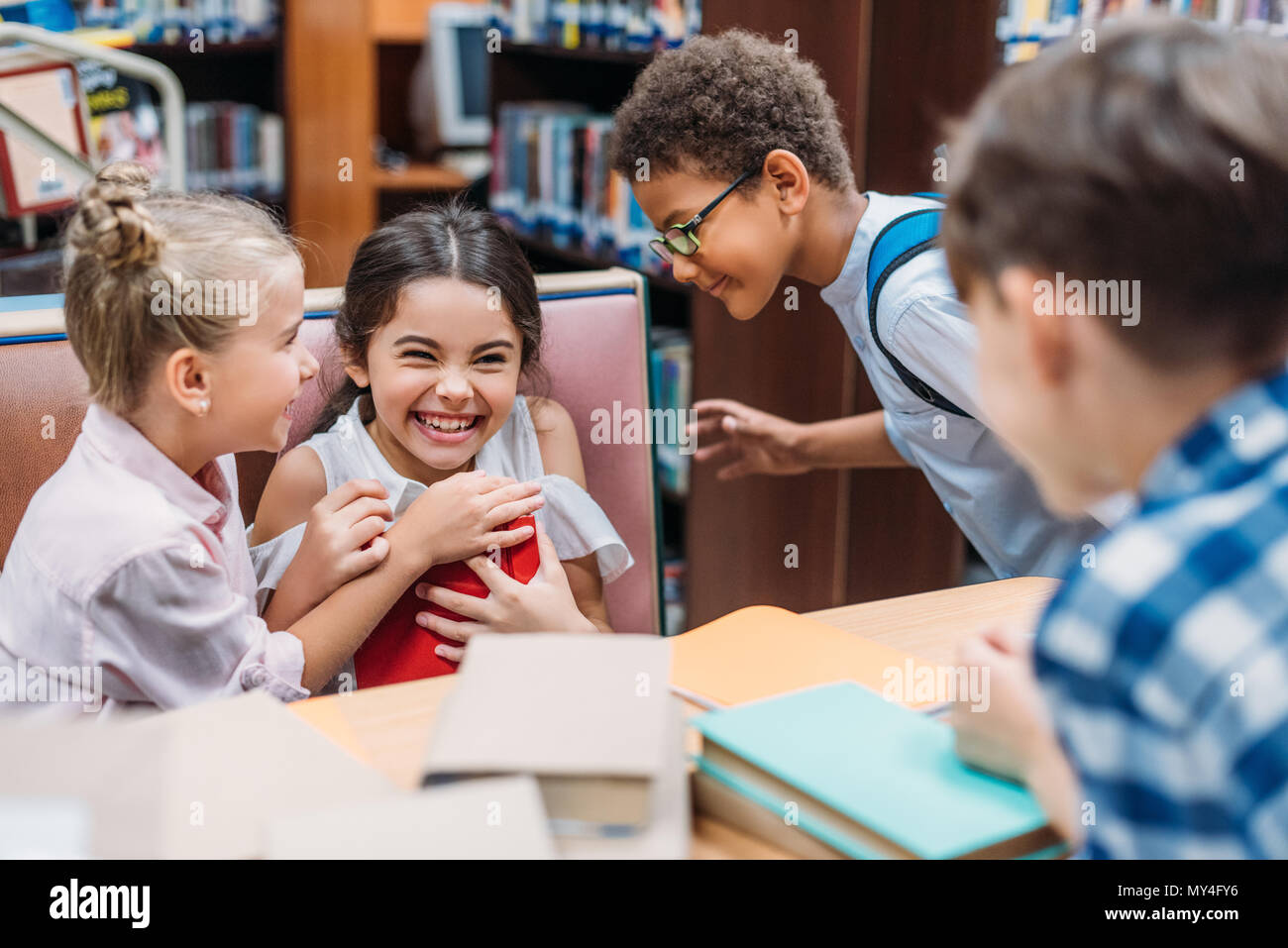People having fun in library hi-res stock photography and images - Alamy