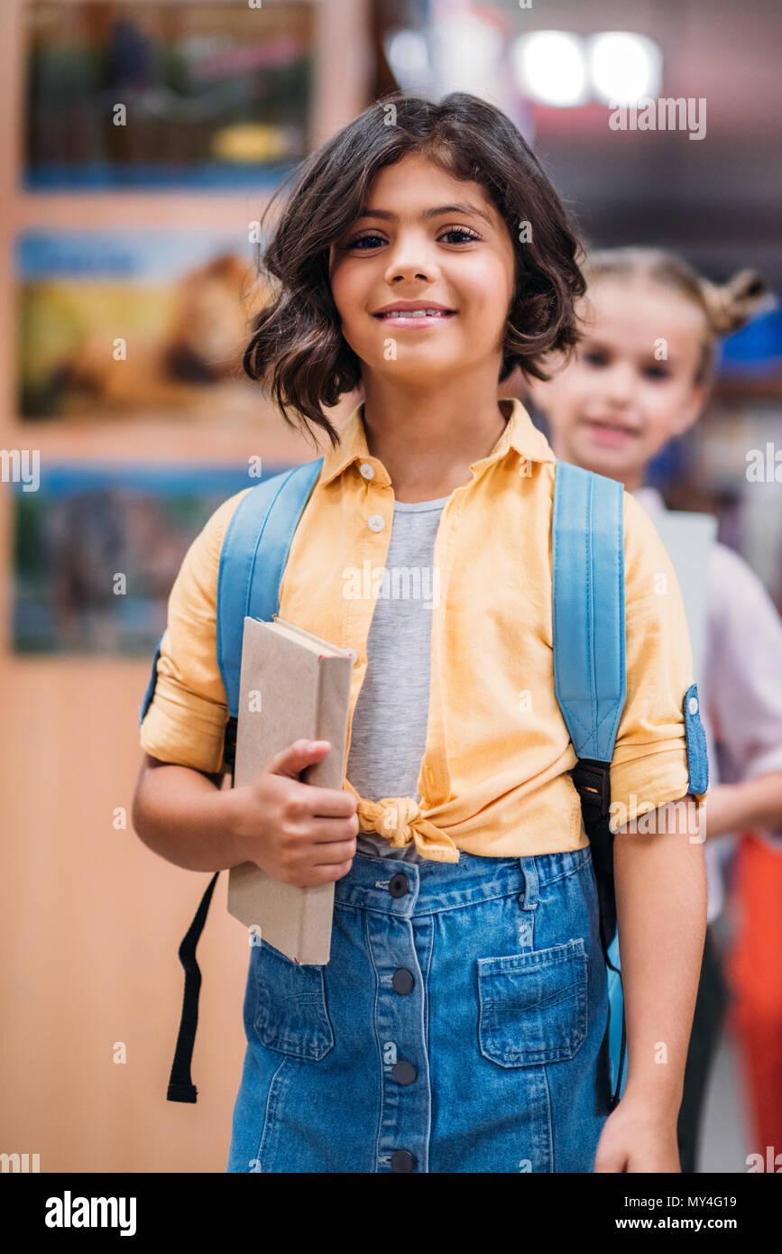 beautiful little schoolgirls in school library Stock Photo - Alamy