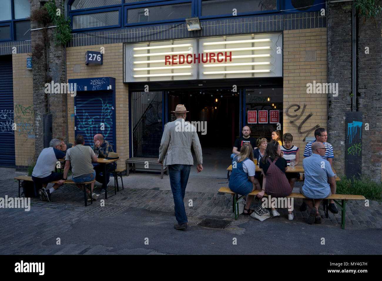 Trendy bar and brewery under railway arches by train and overground ...