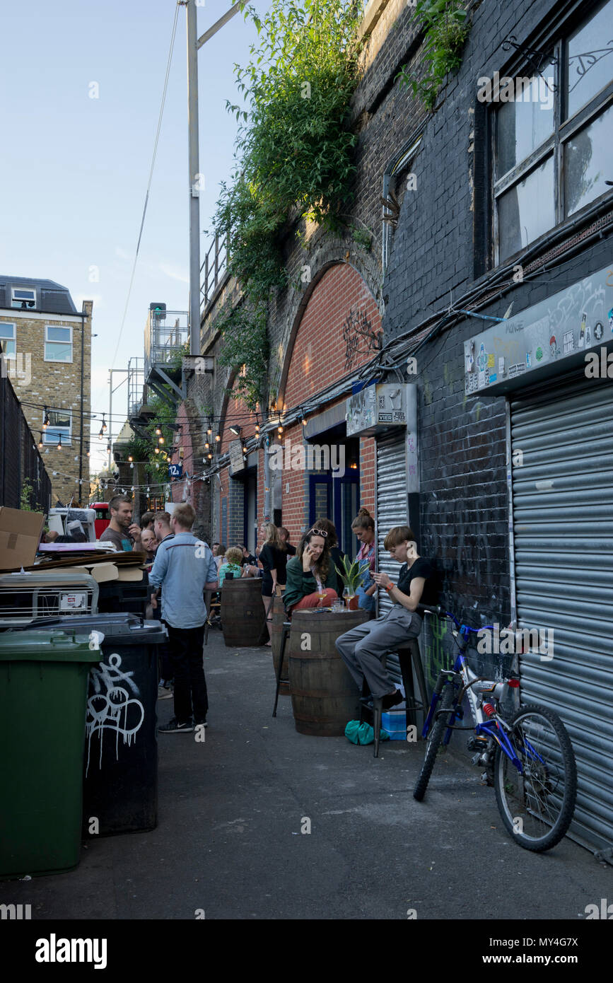 Trendy bar and brewery under railway arches by train and overground ...