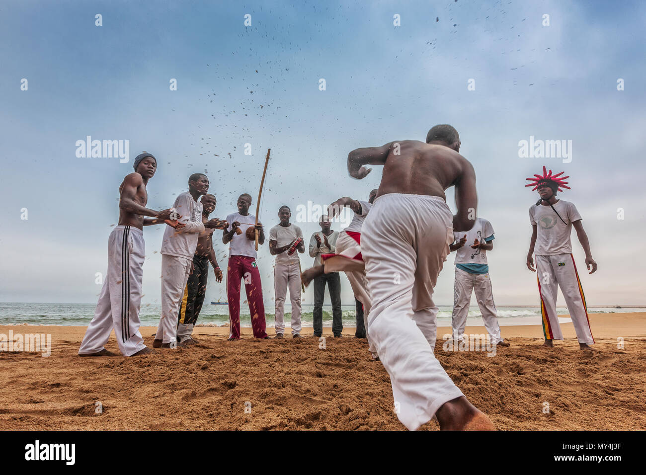 NAMIBE/ANGOLA - 28 AUG 2013 - African sportsmen practicing the famous ...